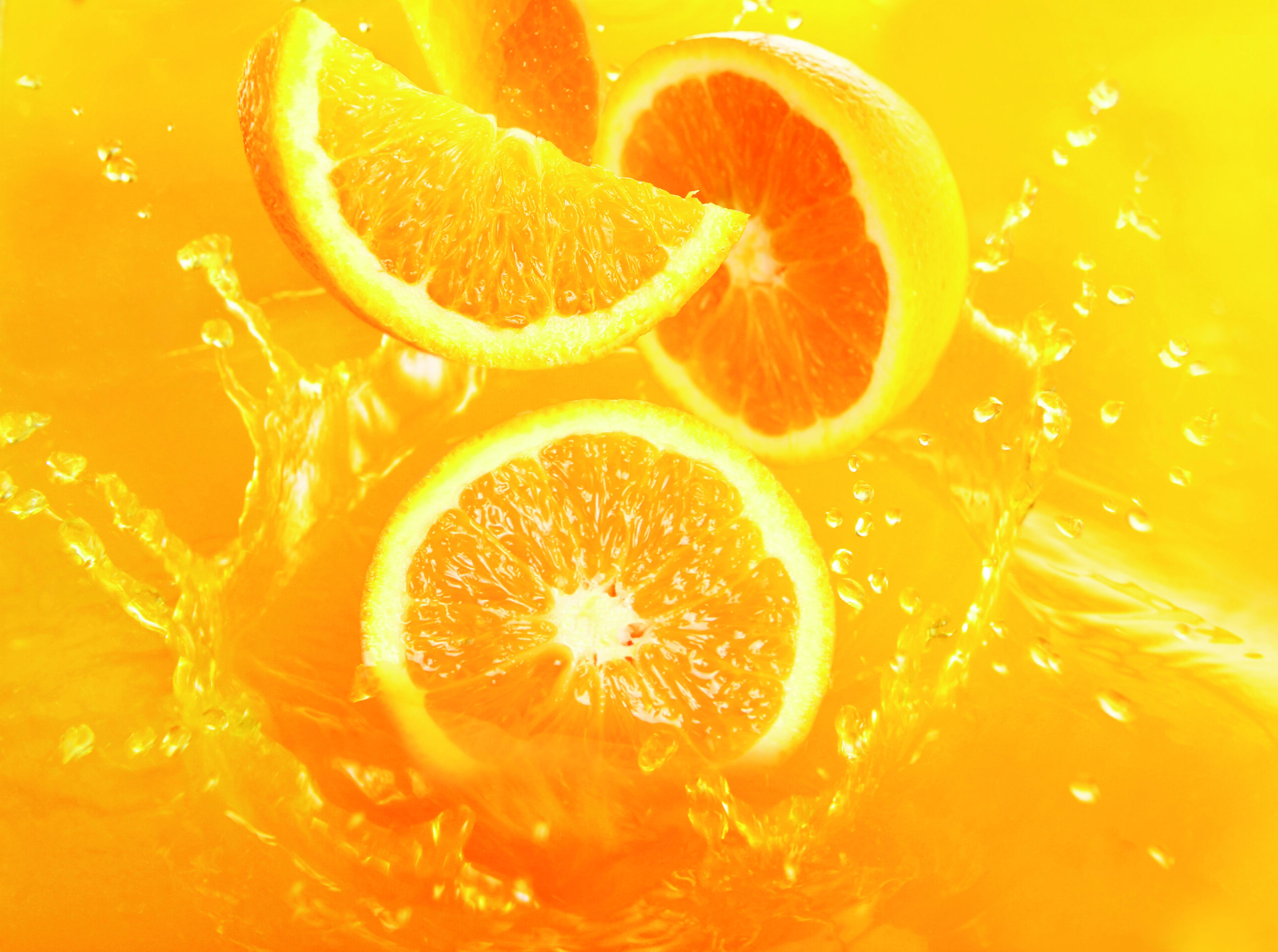 Fresh oranges falling in juice - Aire-Master